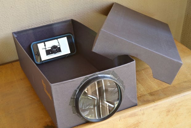 Build A Cheapo Photo Projector Using A Phone Shoebox And Magnifying Glass